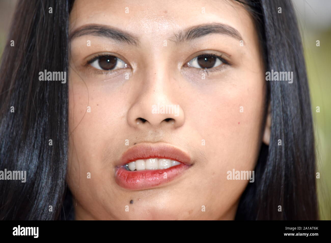 A Smirking Attractive Female Stock Photo - Alamy