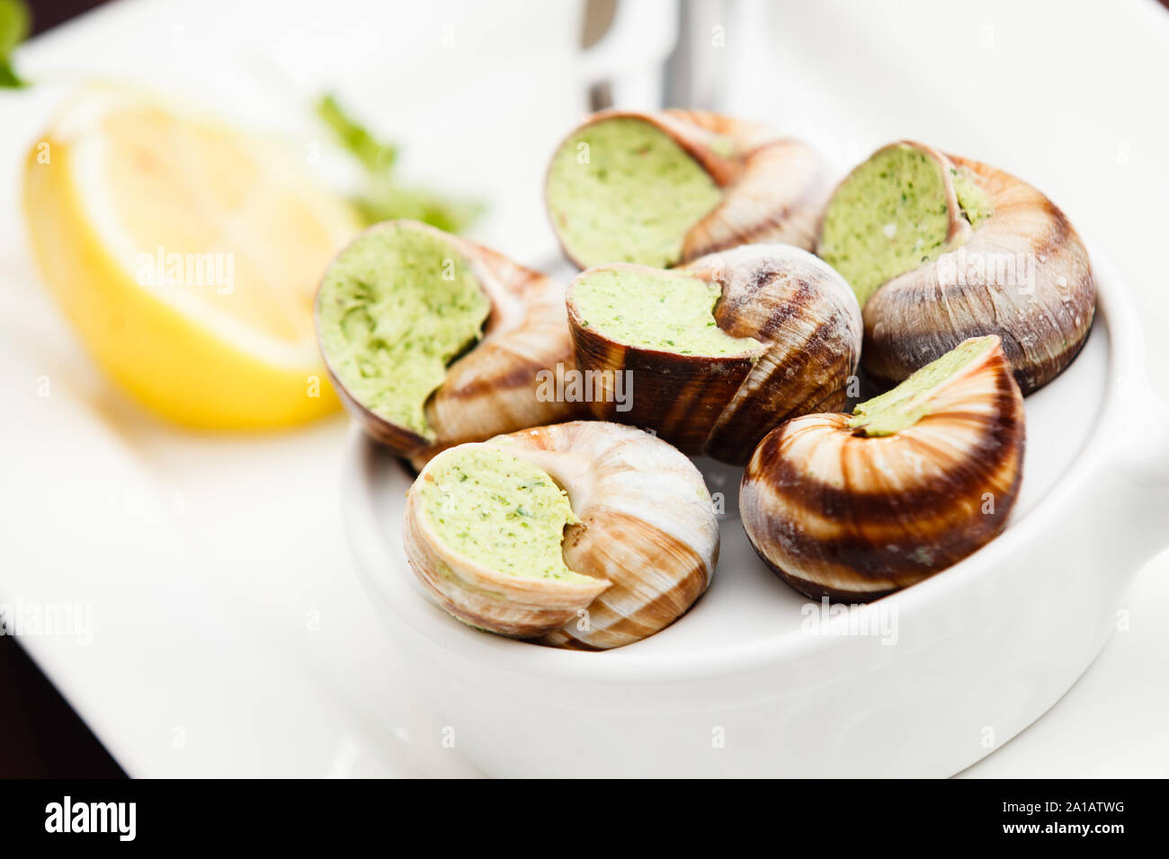 Escargots with garlic butter Stock Photo - Alamy