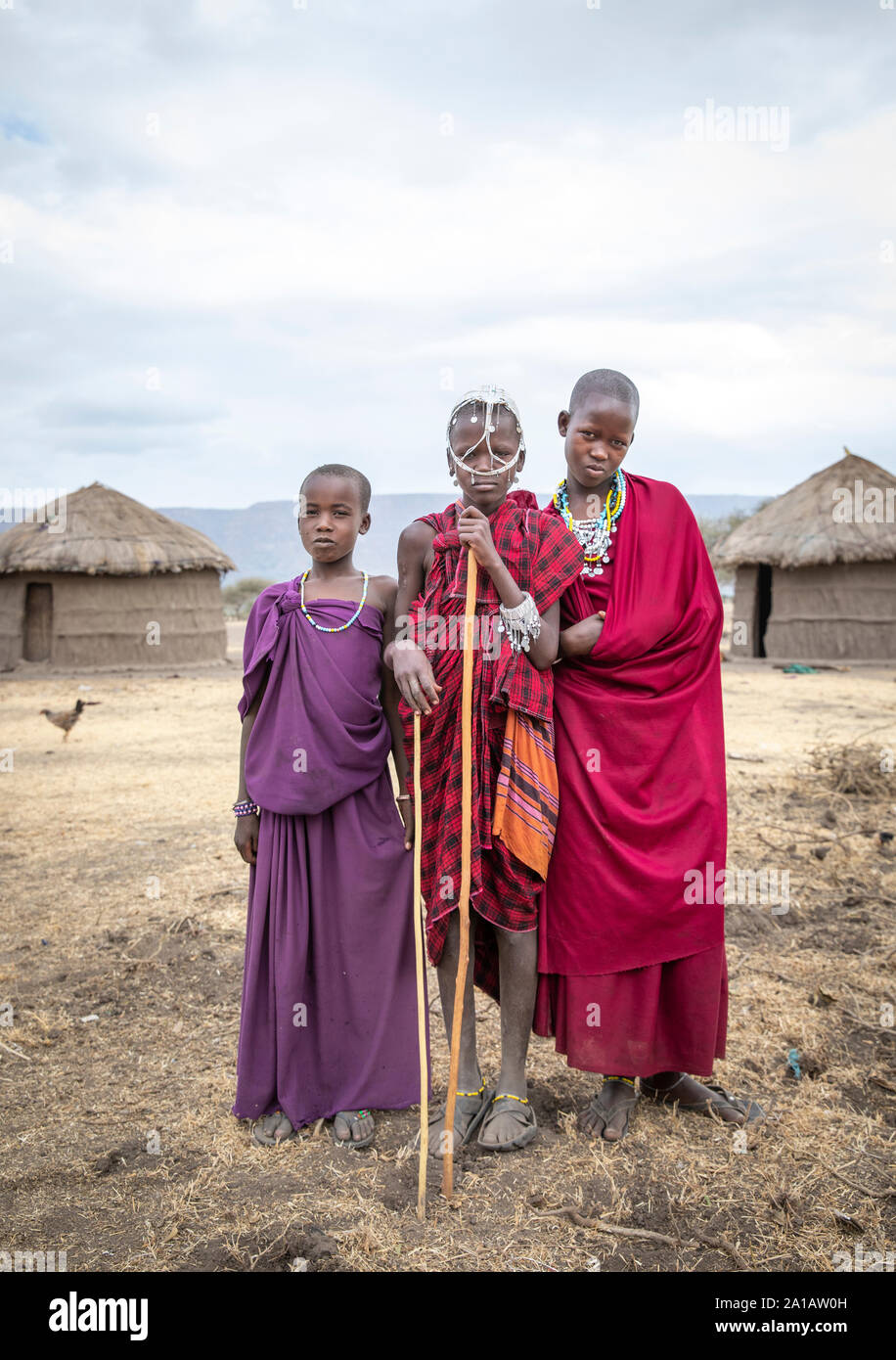 Arusha, Tanzania, 10th September 2019: young maasai kids in traditional ...