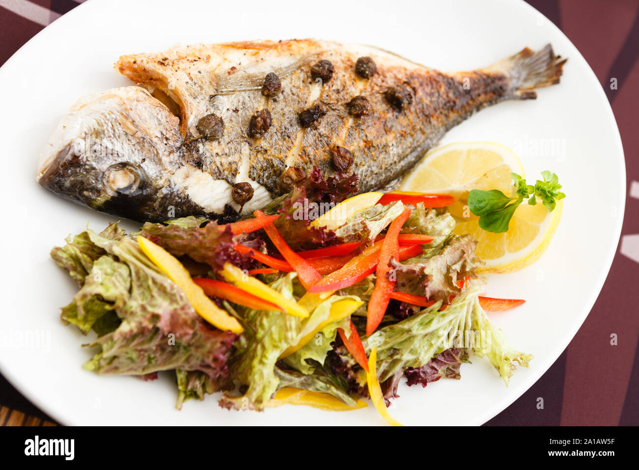 Grilled gilt-head bream fish Stock Photo - Alamy