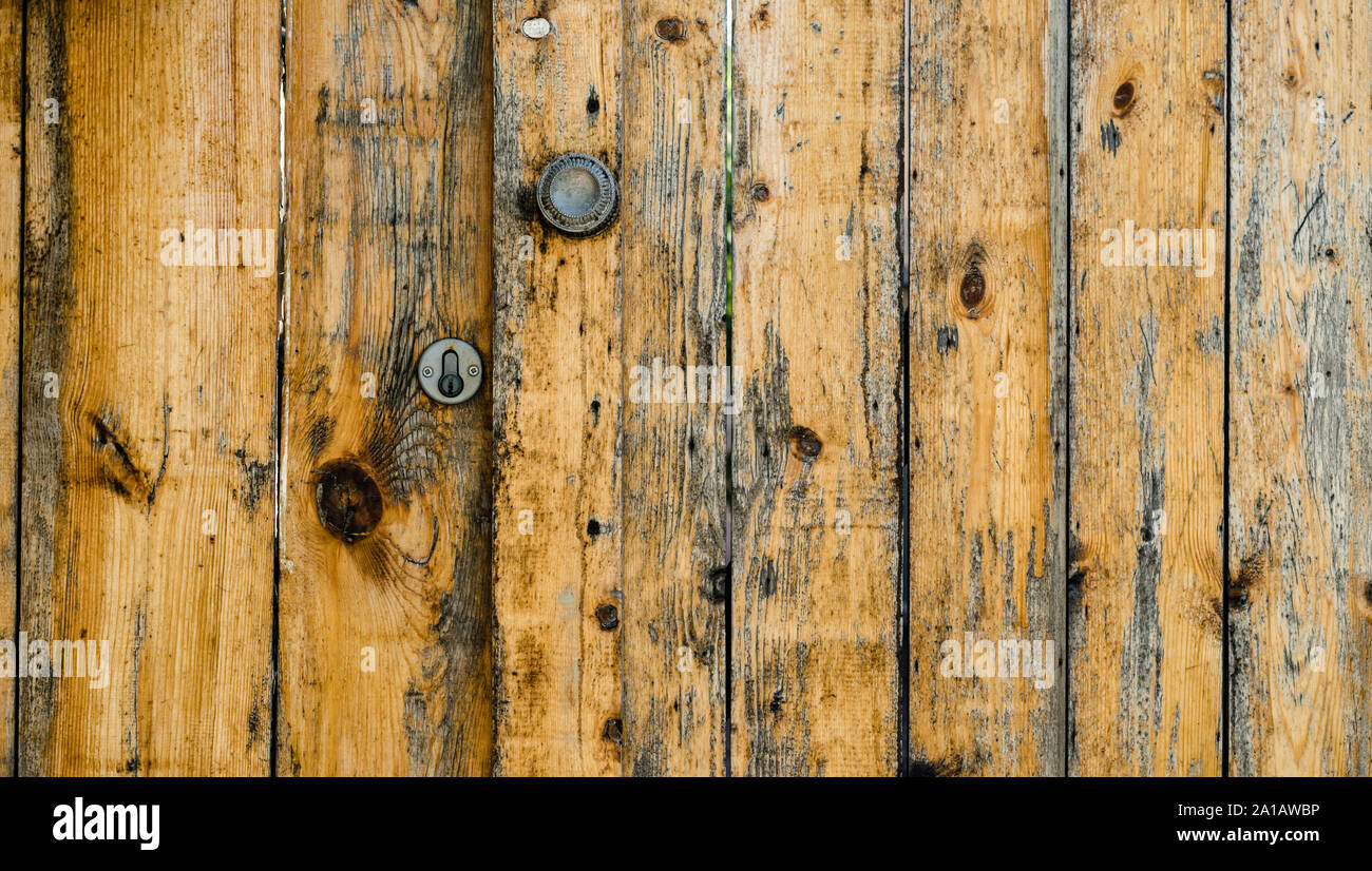 texture old wooden door with door handle and door lock Stock Photo - Alamy