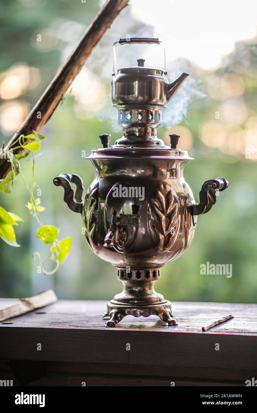 Traditional old metal russian samovar. Tea time Stock Photo - Alamy
