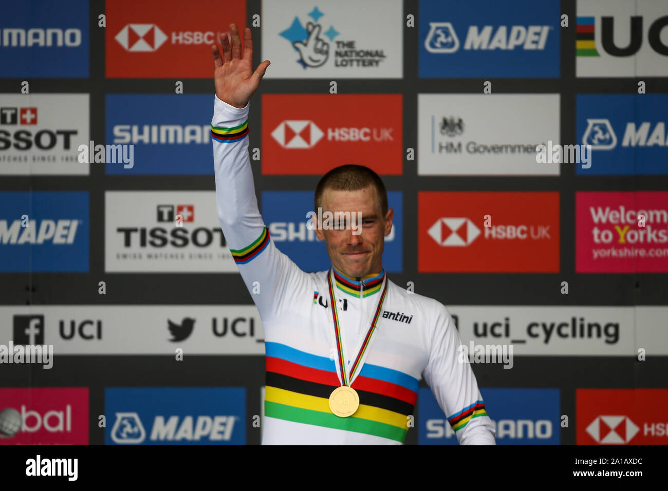 Harrogate, UK. 25th September 2019. Australia's Rohan Dennis crosses ...