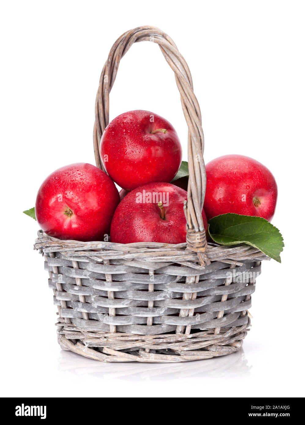 Ripe red apples in basket. Isolated on white background Stock Photo - Alamy