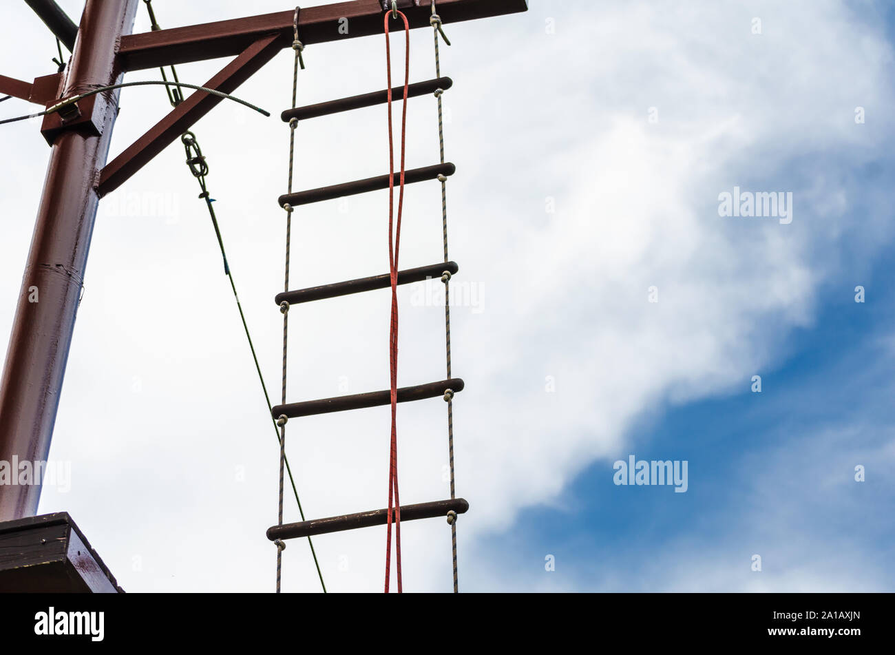 rope ladder against a blue sky and clouds Stock Photo - Alamy