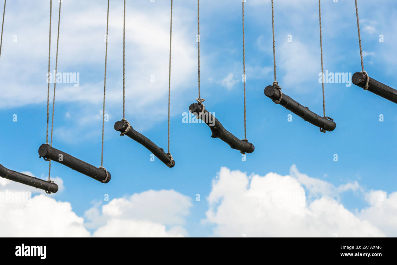 rope ladder against a blue sky and clouds Stock Photo - Alamy
