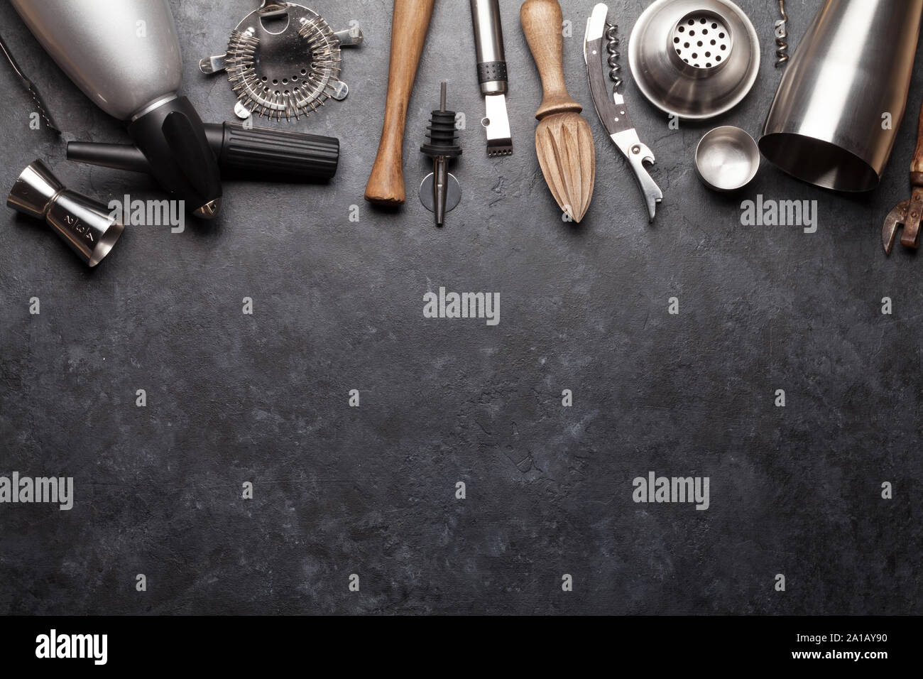 Cocktail utensils. Set of bar tools on stone table. Top view flat lay ...
