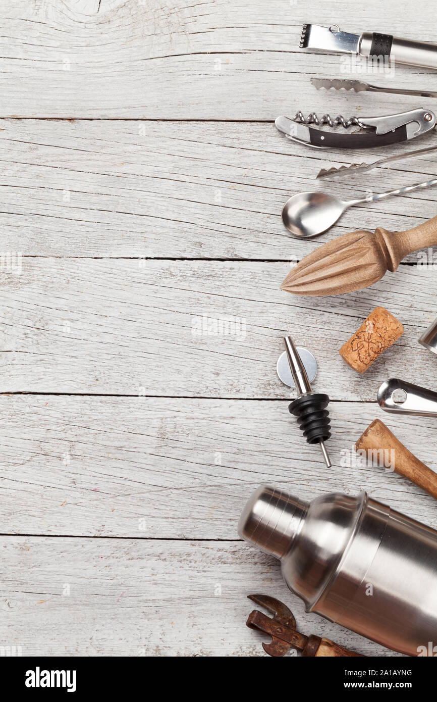 Cocktail utensils. Set of bar tools on wooden table. Top view flat lay ...