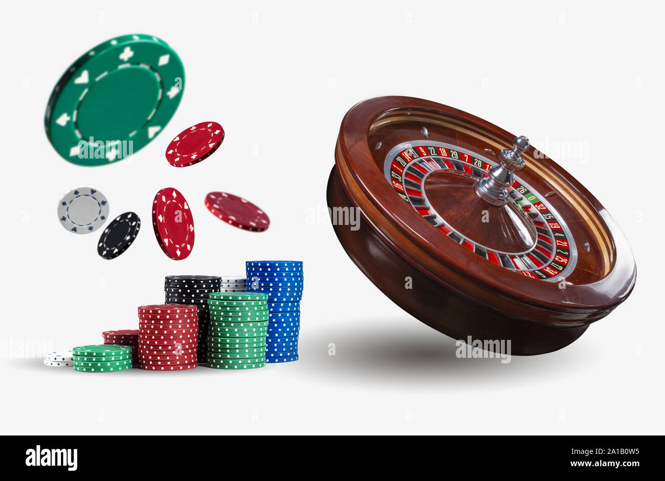 Close-up photo of a brown roulette and chips in piles which are flying ...