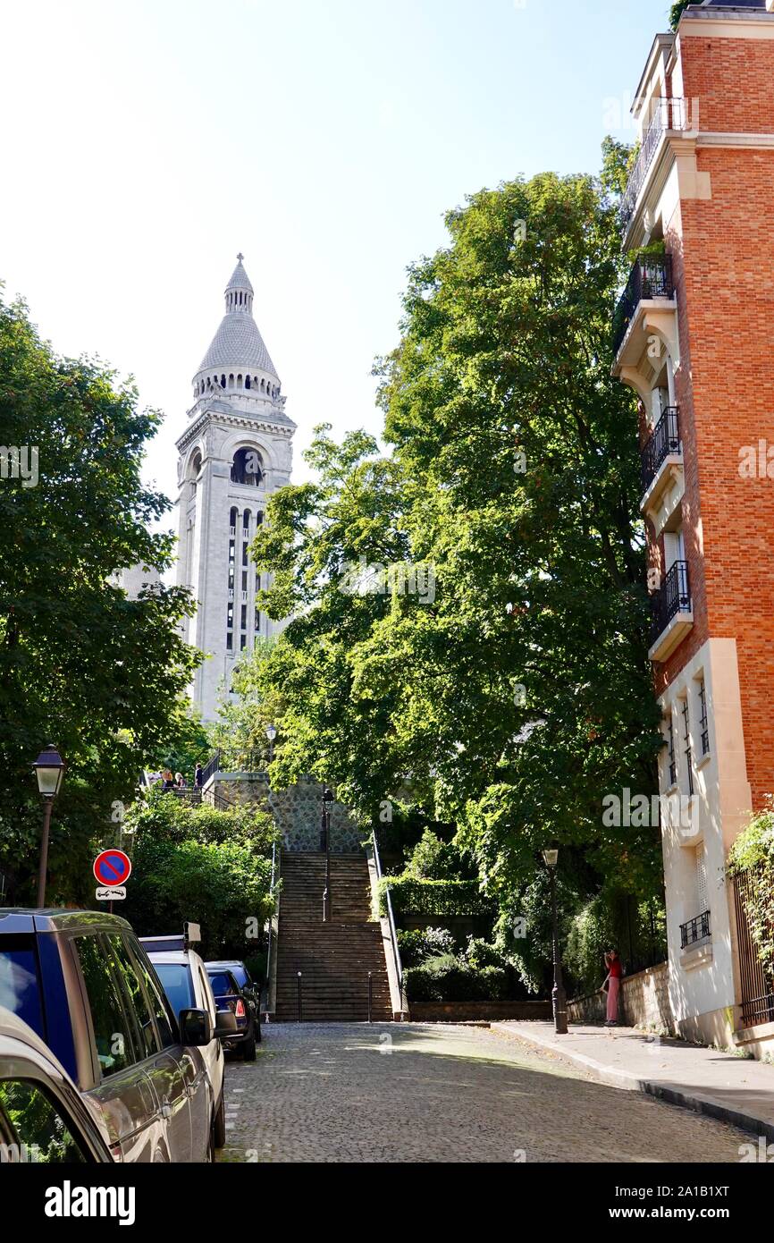 Steep steps behind the Basilica and bell tower of Sacré Coeur ...