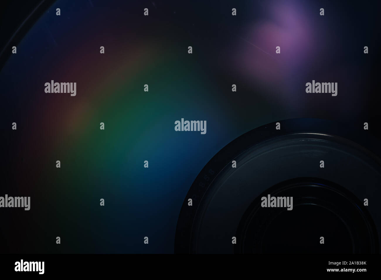 Close up beautiful CD and DVD disk tape colored background Stock Photo ...