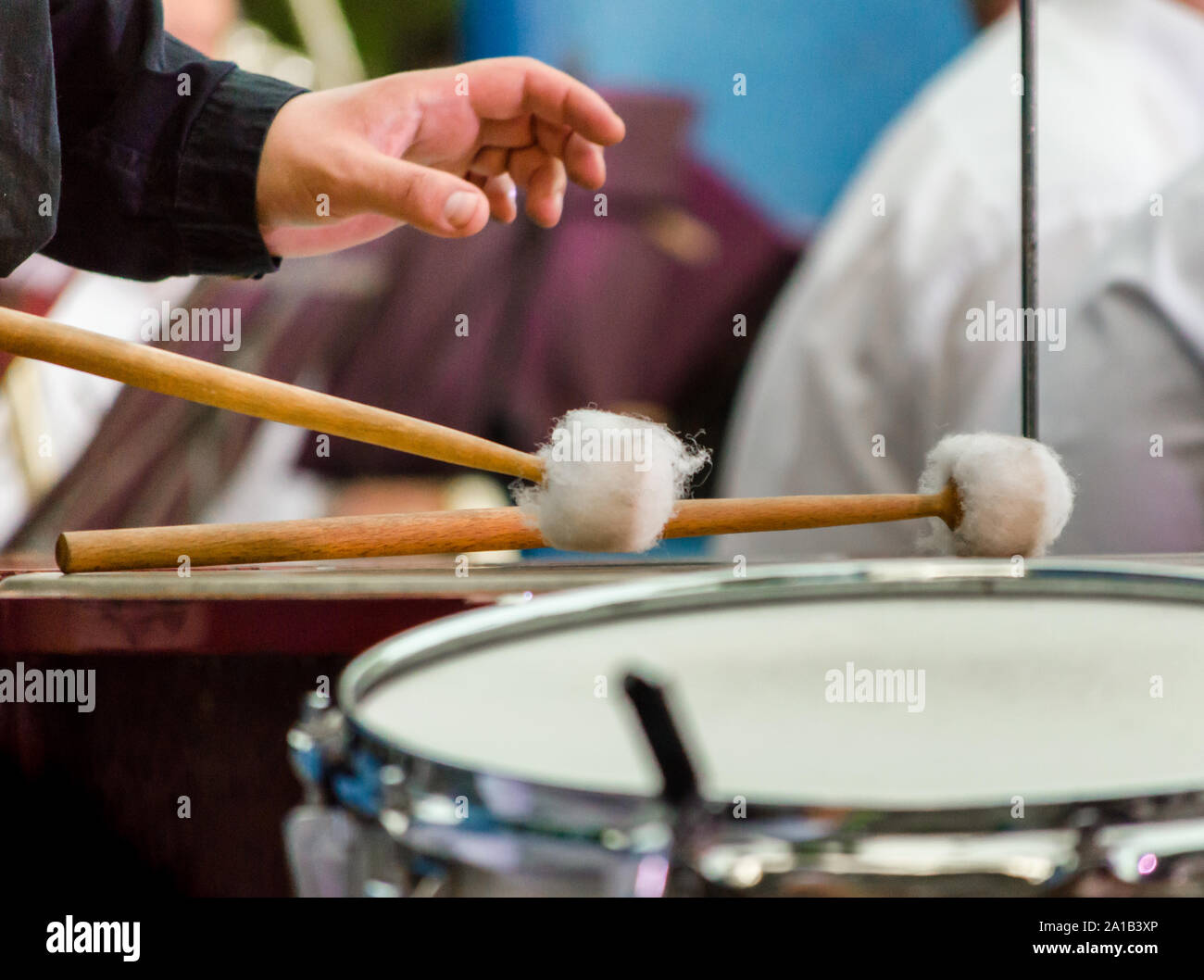 male musician drummer hand with drumsticks and drum closeup Stock Photo ...