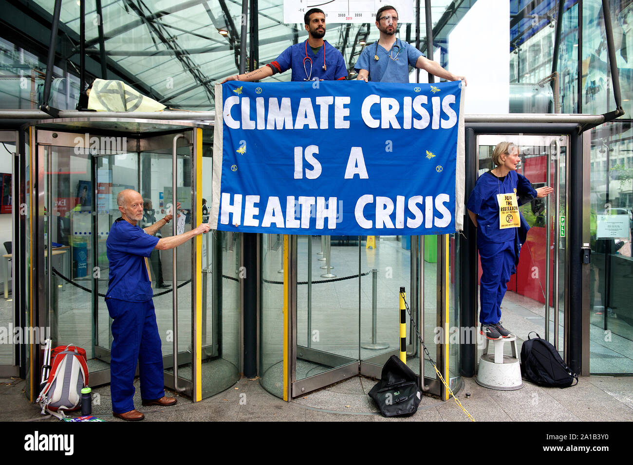 London, UK. 25th September, 2019. Doctors protesting with Extinction ...