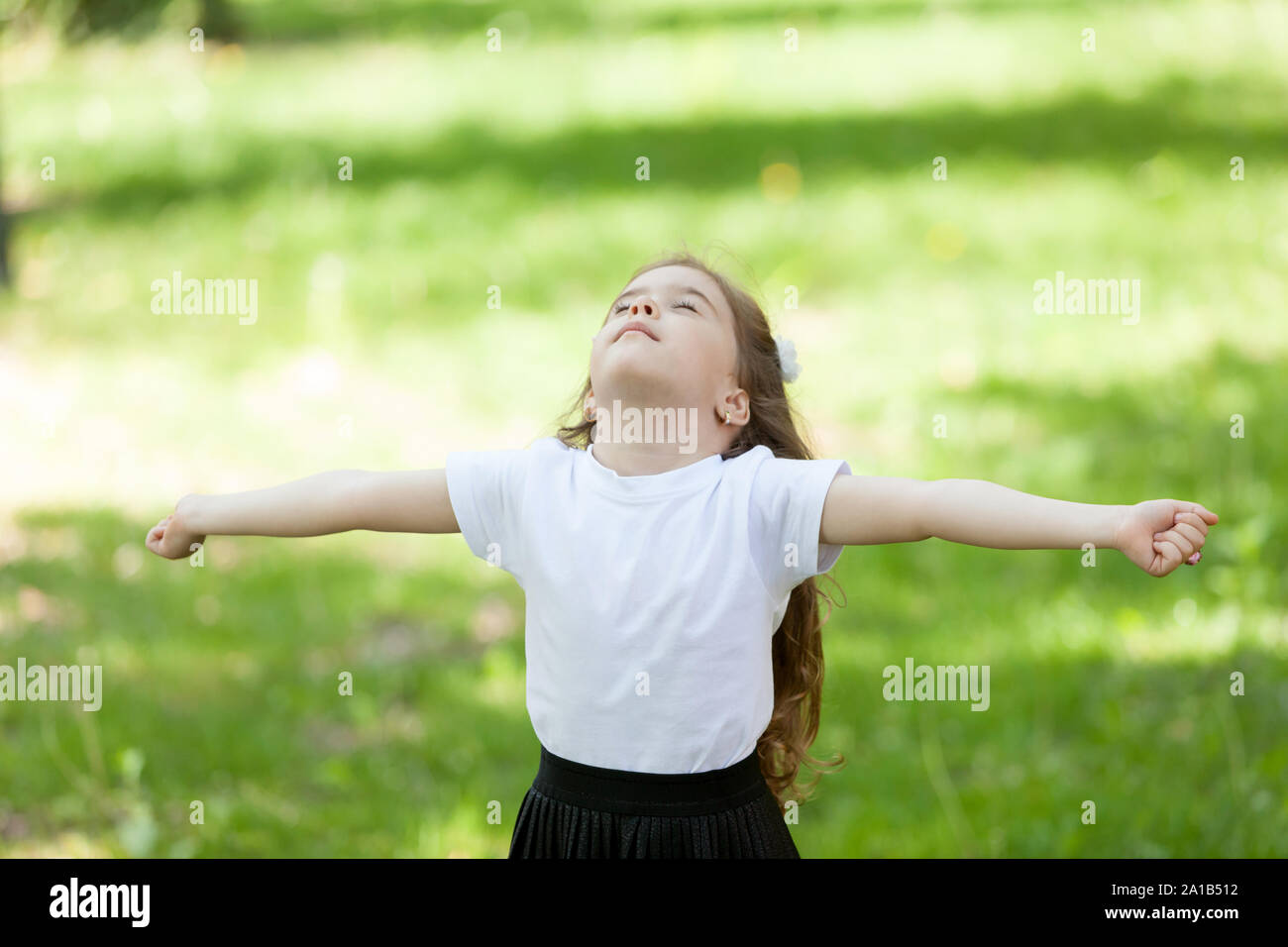 A lovely little girl having quality time in nature Stock Photo - Alamy