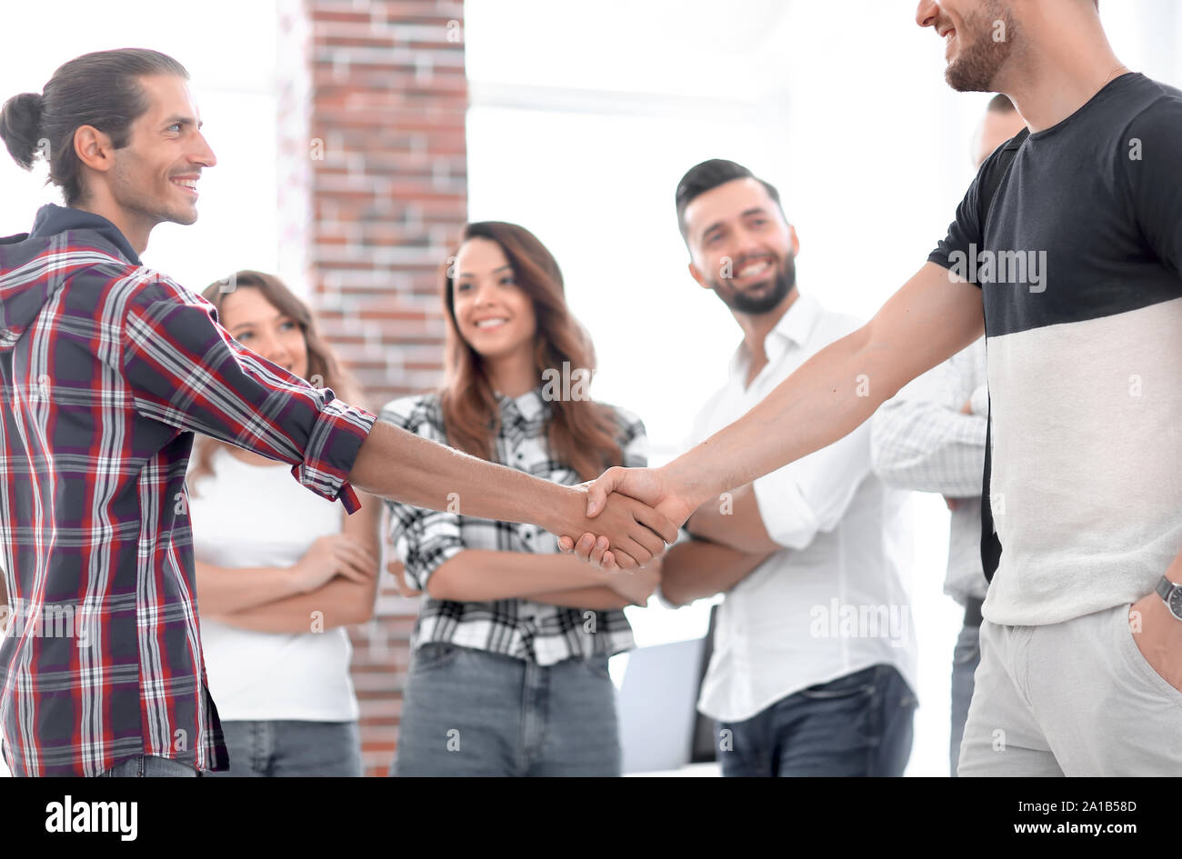 handshake Manager and customer in the office Stock Photo - Alamy
