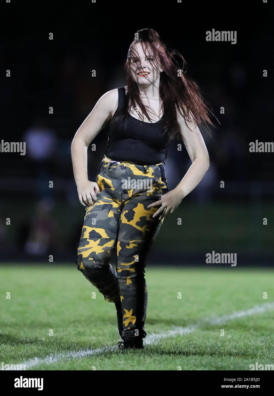 Post Falls High School Dance Team performing during a football game in ...
