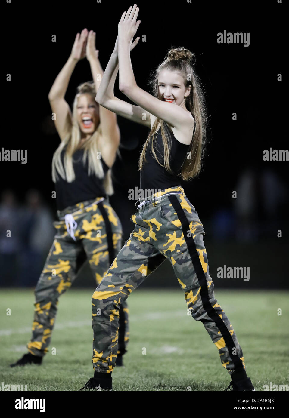 Post Falls High School Dance Team performing during a football game in ...