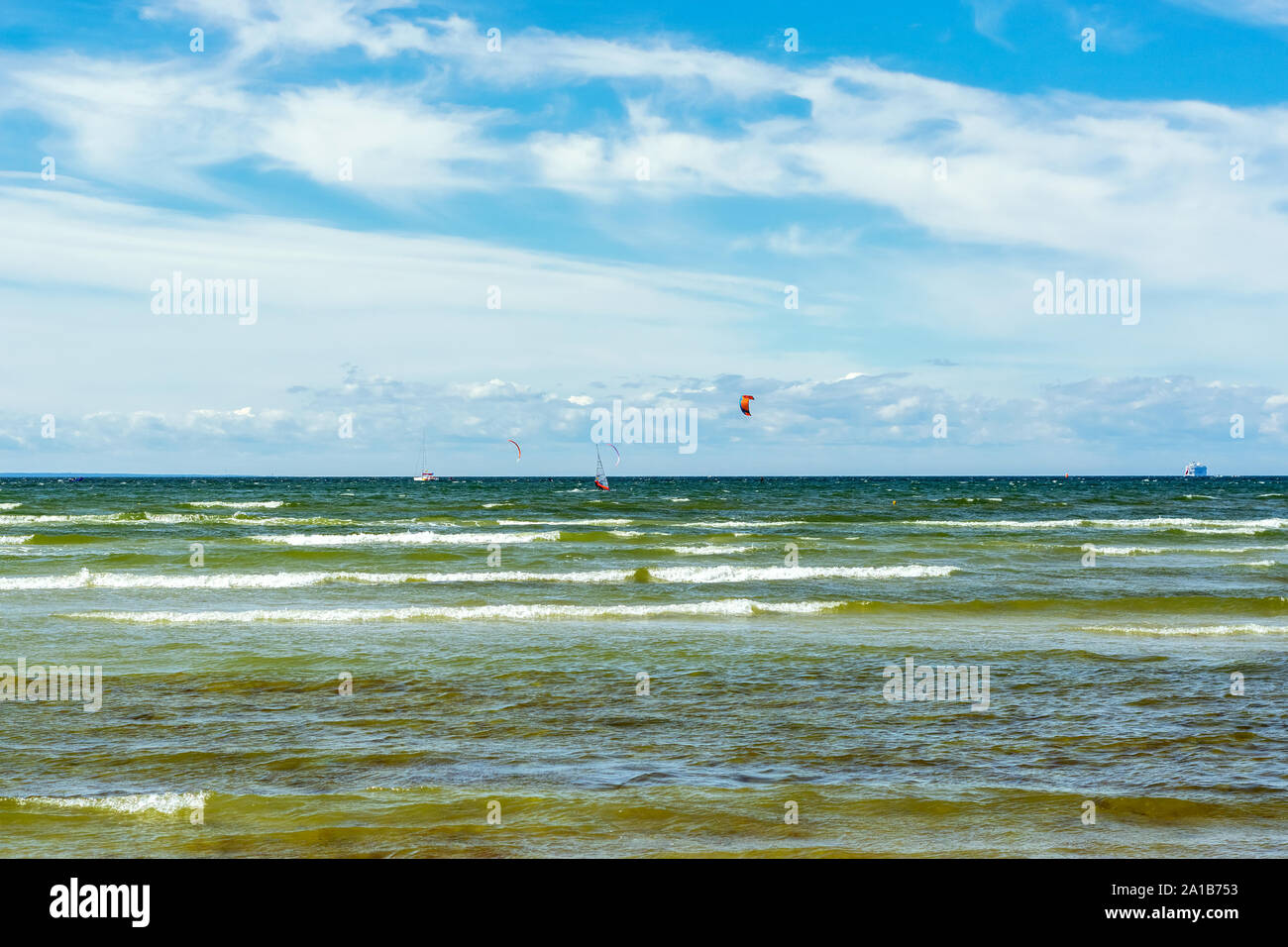 View of the Gulf of Finland with small waves with kiteboarding and ...
