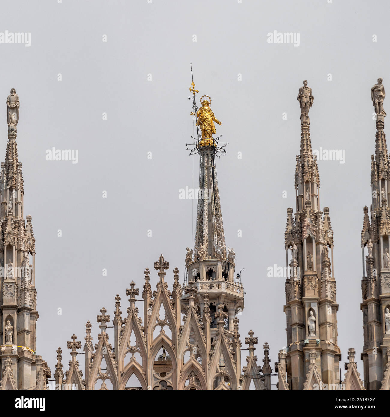 Gold Sculpture at Top of Duomo Cathedral in Milan Italy Stock Photo - Alamy