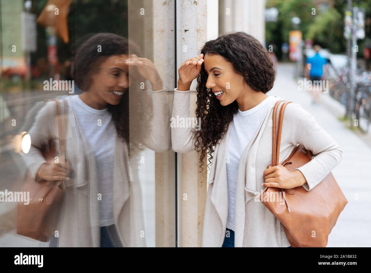 Woman reflected window hi-res stock photography and images - Alamy