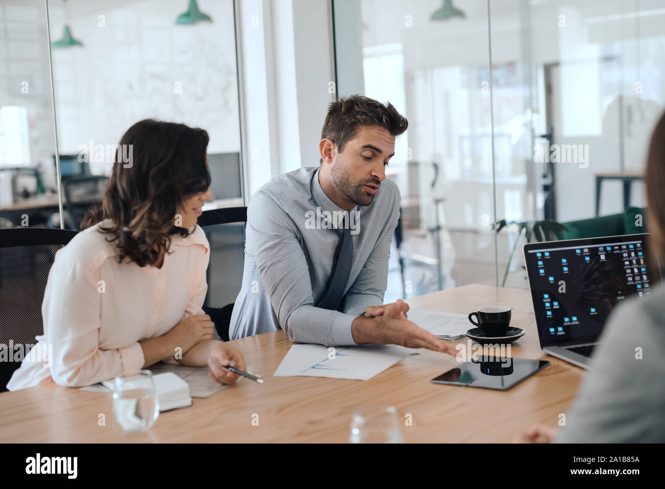 Caucasian business woman discussing work hi-res stock photography and ...