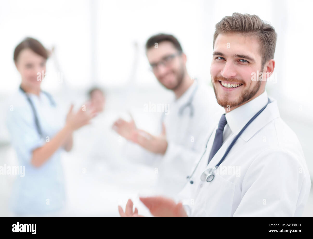 Doctors clapping hands and applauding on consent Stock Photo - Alamy