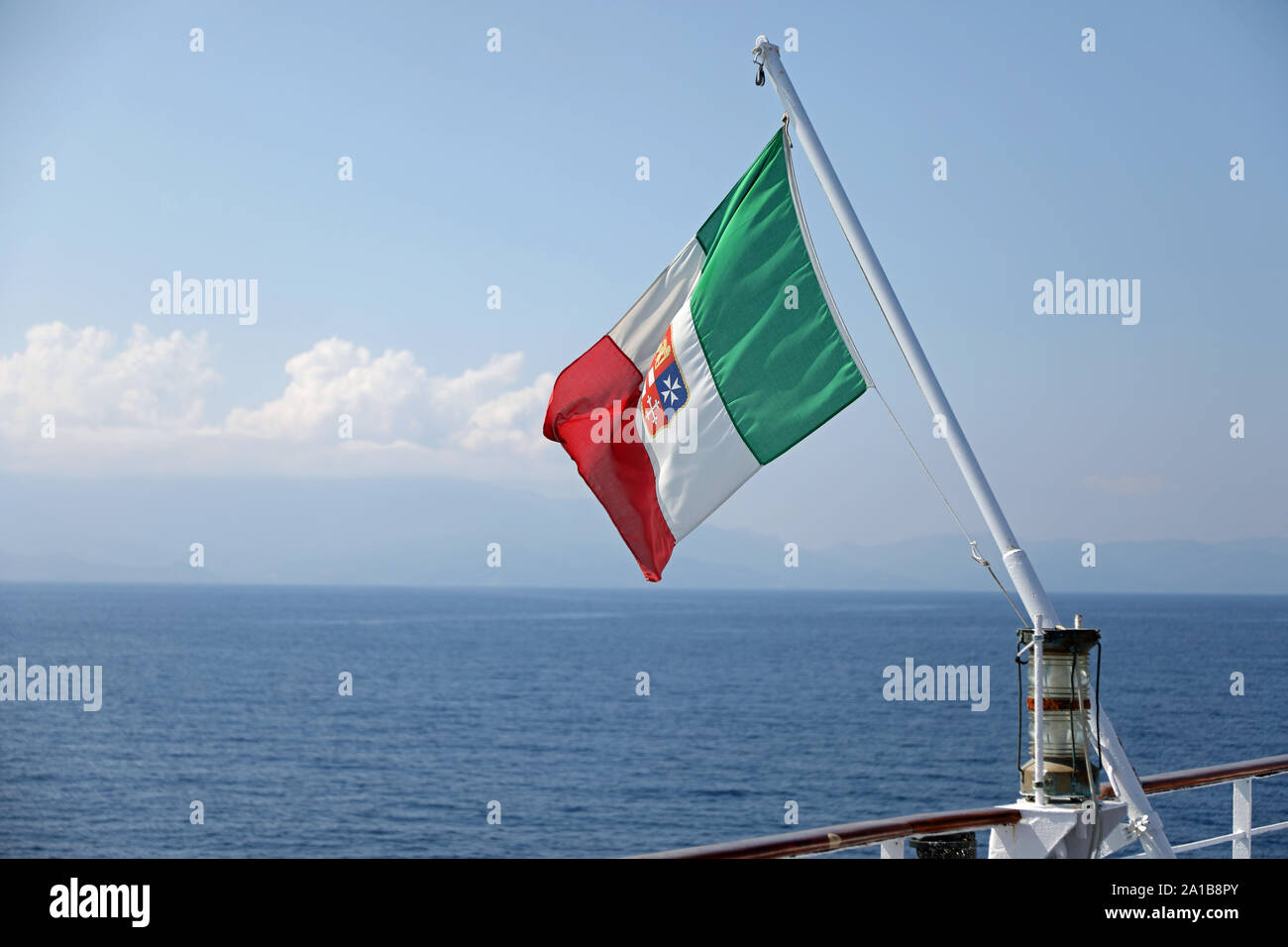 Italian flag on the Cruise Ship liner and the mediterranean sea Stock ...