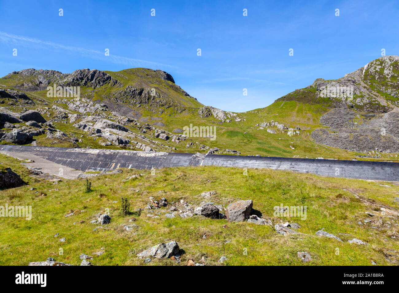 Looking over the overflow of Llyn Stwlan reservoir towards the summit ...