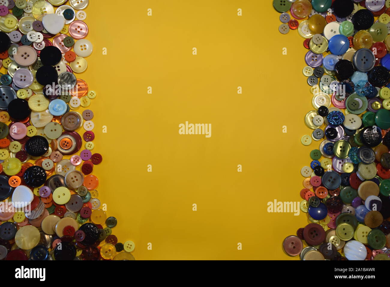 coloured mix of buttons of different size and shape Stock Photo - Alamy