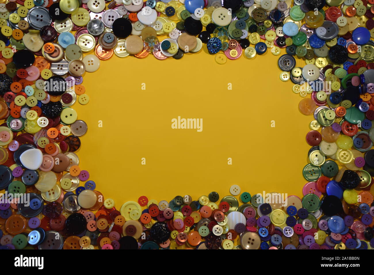 coloured mix of buttons of different size and shape Stock Photo - Alamy