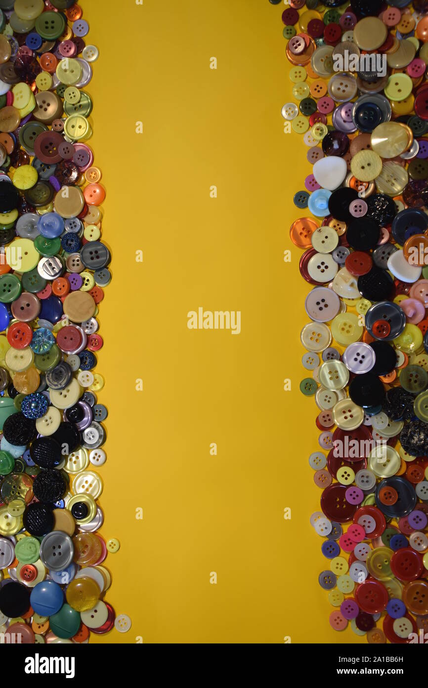 coloured mix of buttons of different size and shape Stock Photo - Alamy