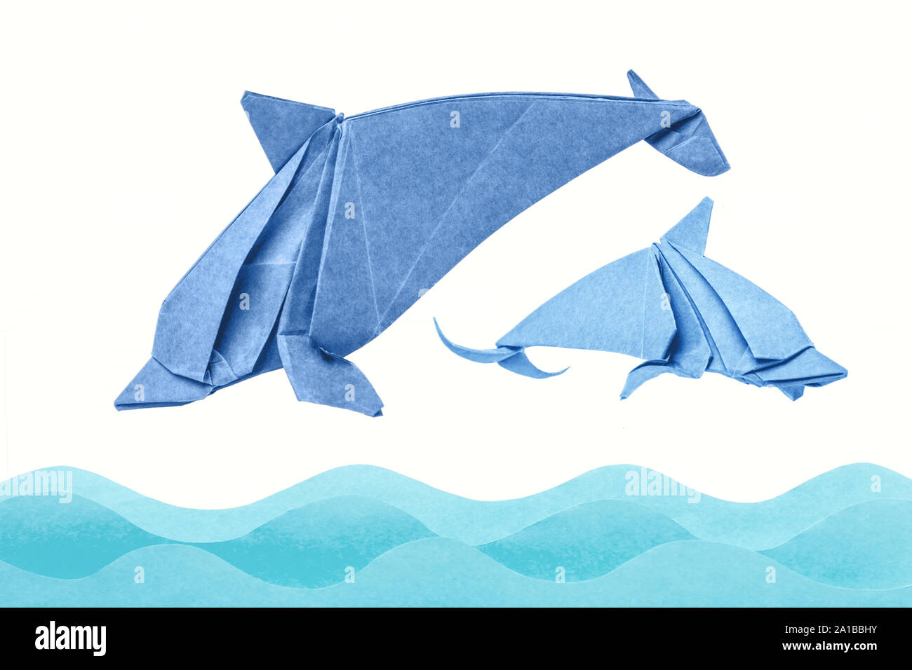 Dolphin origami of paper Stock Photo - Alamy