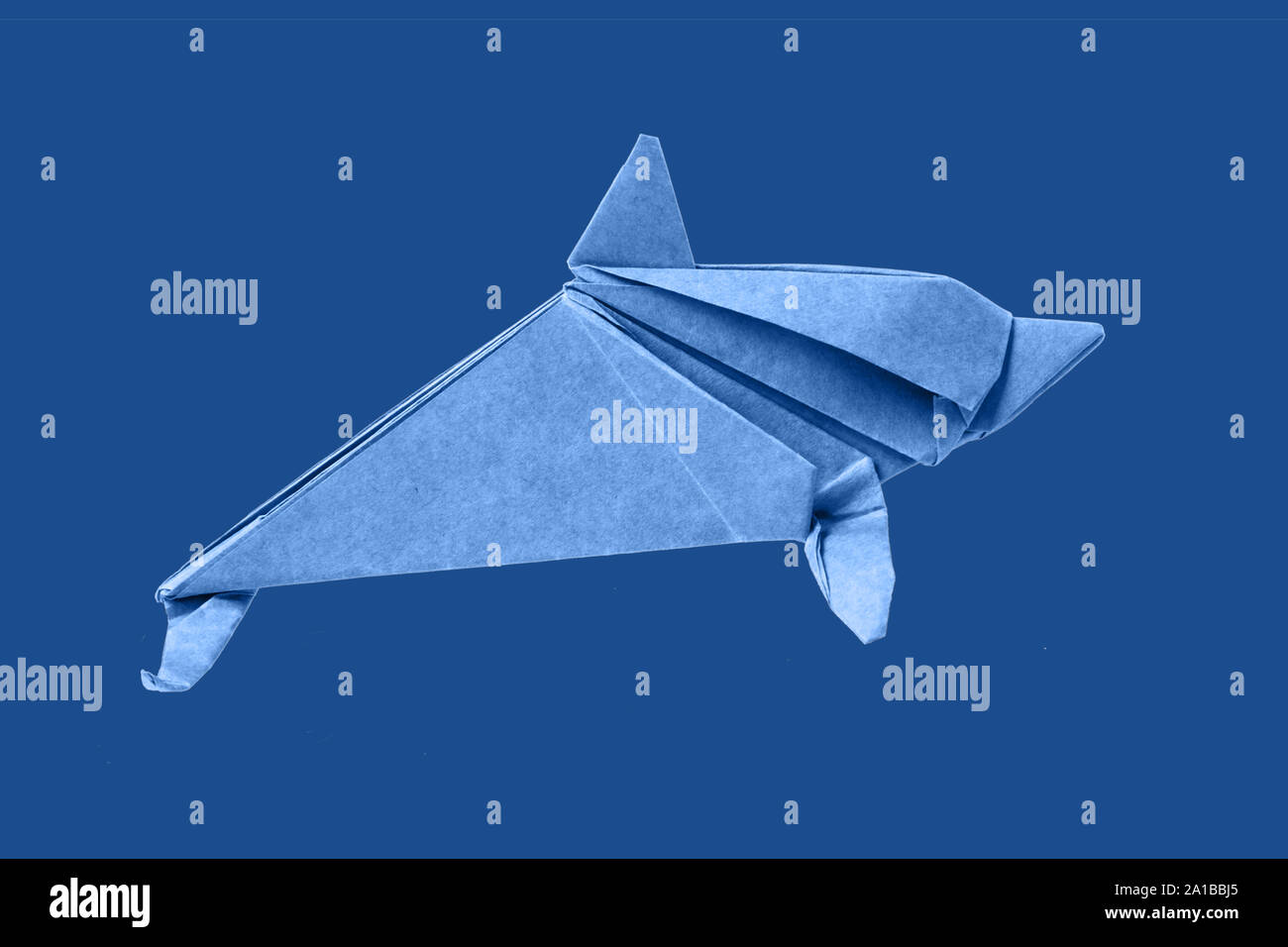 Dolphin origami of paper Stock Photo - Alamy
