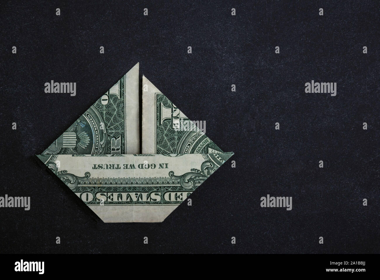 Dollar paper boat hi-res stock photography and images - Alamy
