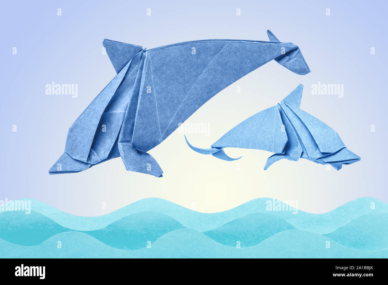 Dolphin origami of paper Stock Photo - Alamy
