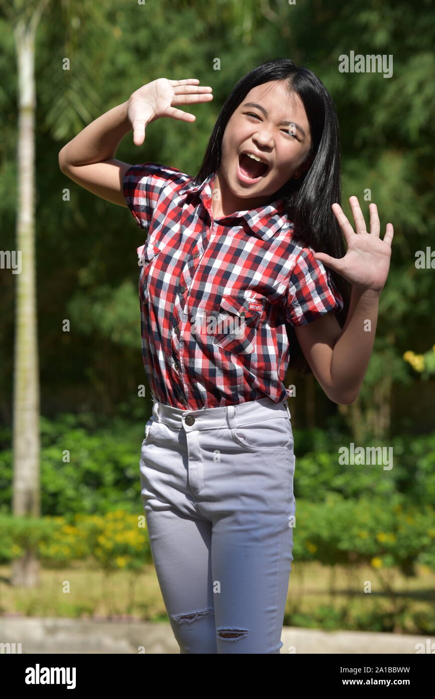 A Petite Diverse Tween Laughing Stock Photo - Alamy
