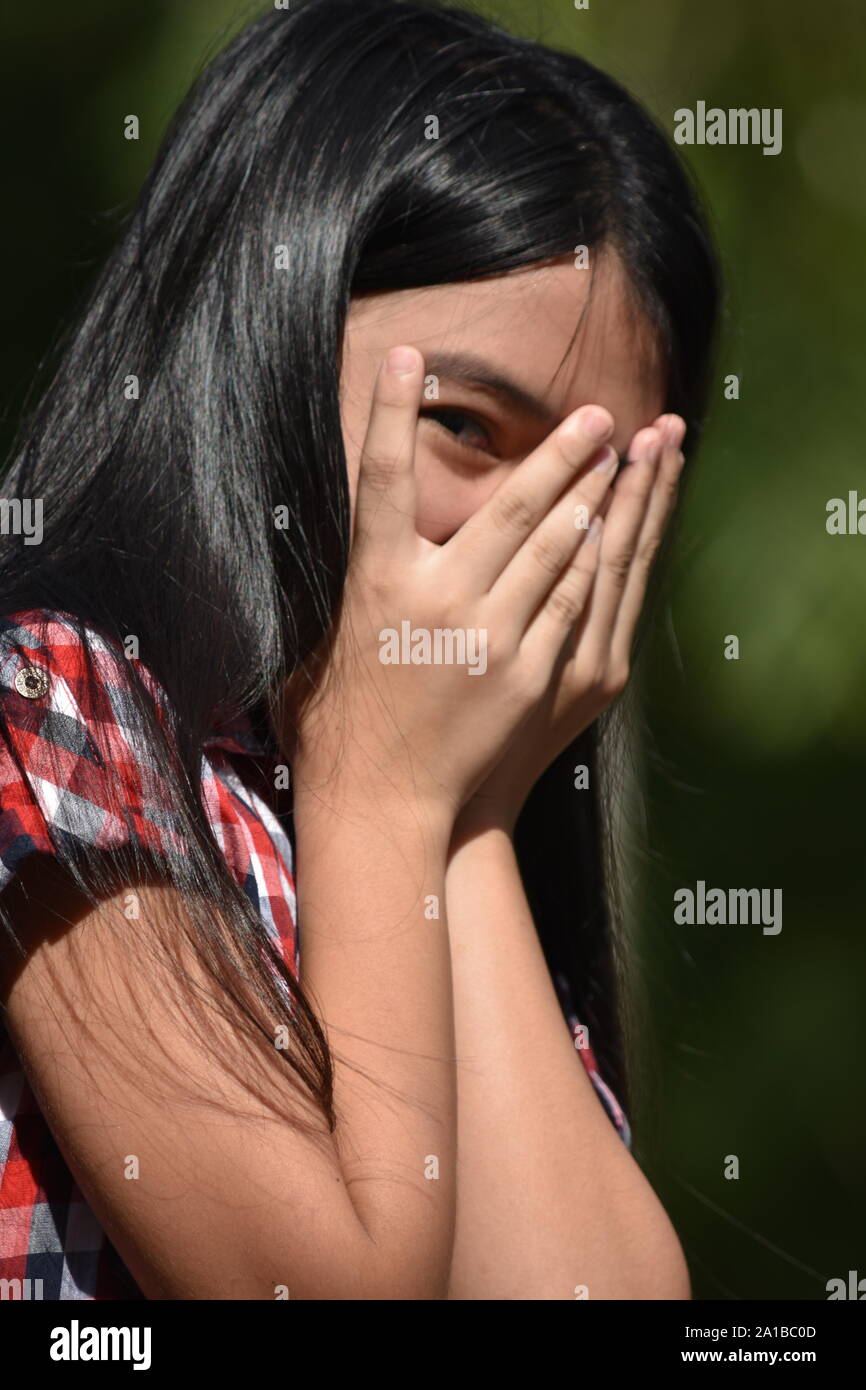 Asian girl child fearful hi-res stock photography and images - Alamy