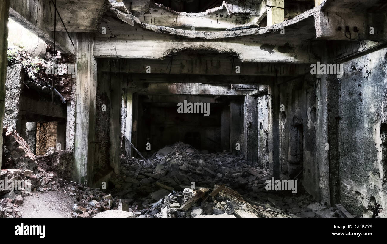 Long-abandoned factory with falling bricks and huge failures. Dangerous ...