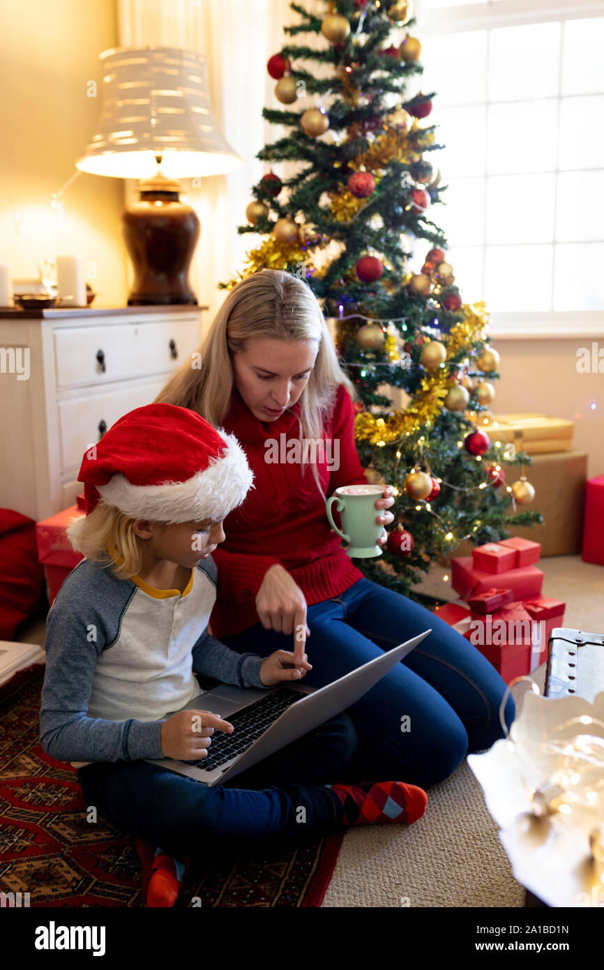 Family at home at Christmas time Stock Photo - Alamy