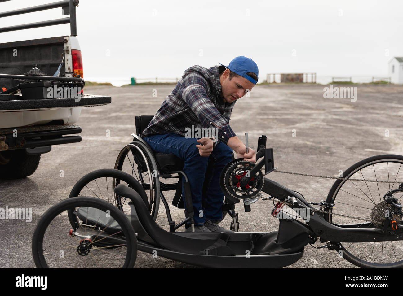Disabled man in a wheelchair enjoying a day out Stock Photo - Alamy