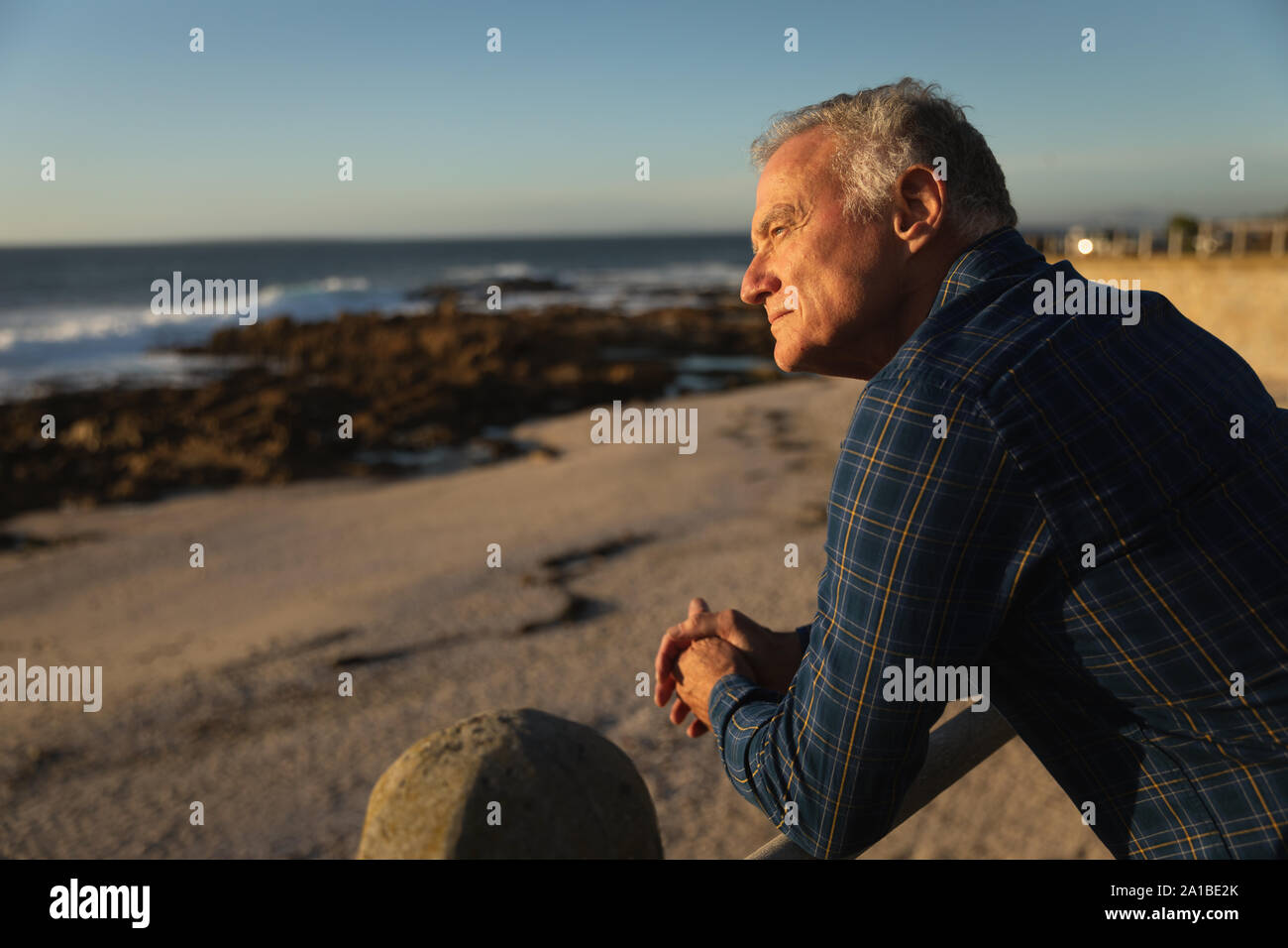 Man enjoying shore sky sunset beach hi-res stock photography and images ...