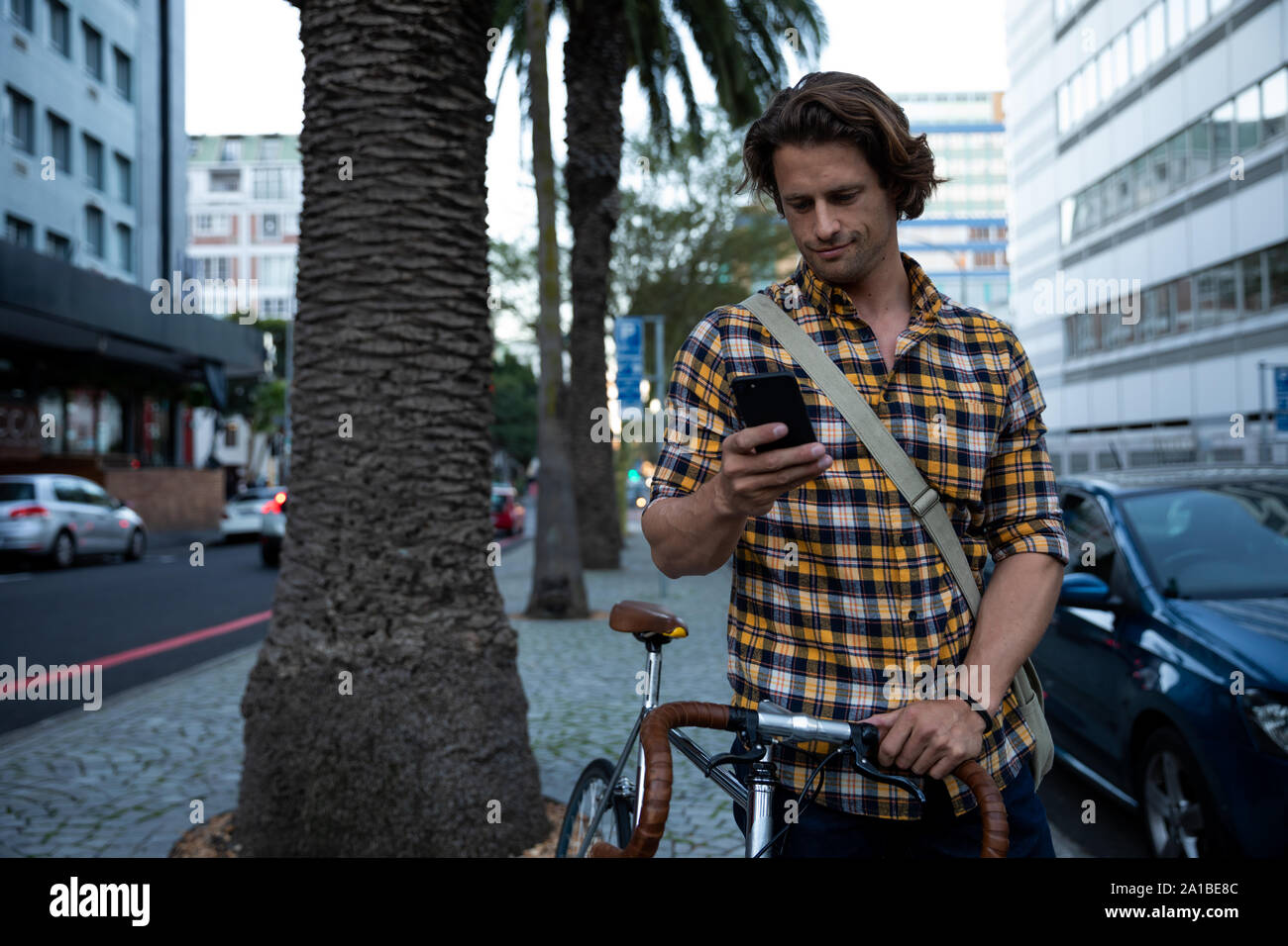 Young man commuting Stock Photo - Alamy