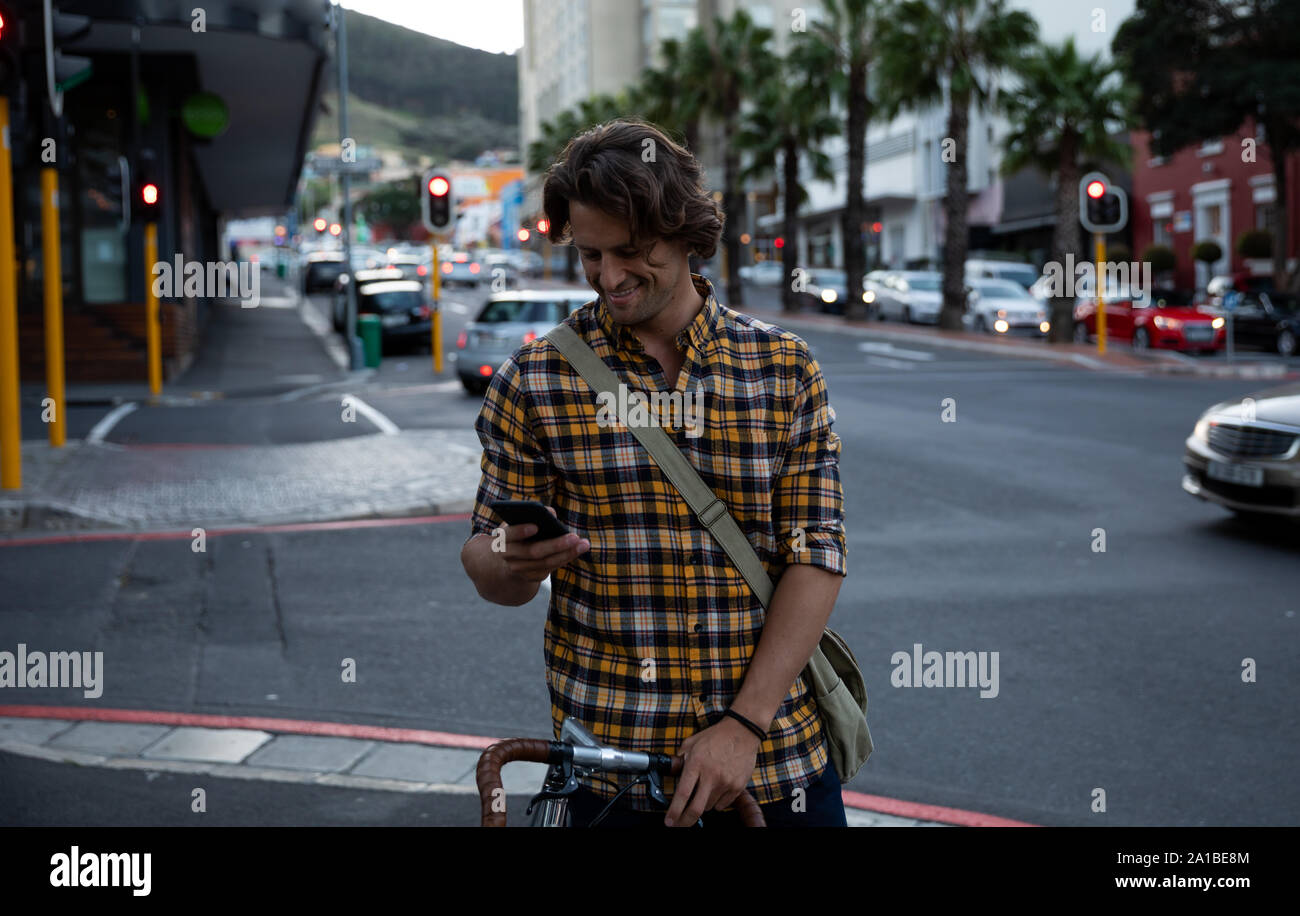 Young man commuting Stock Photo - Alamy