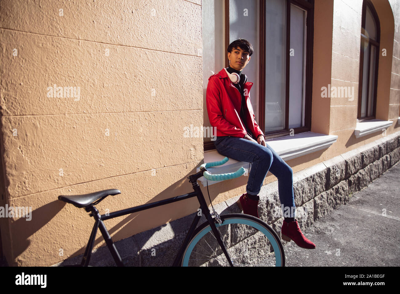 Young transgender adult in the street Stock Photo - Alamy