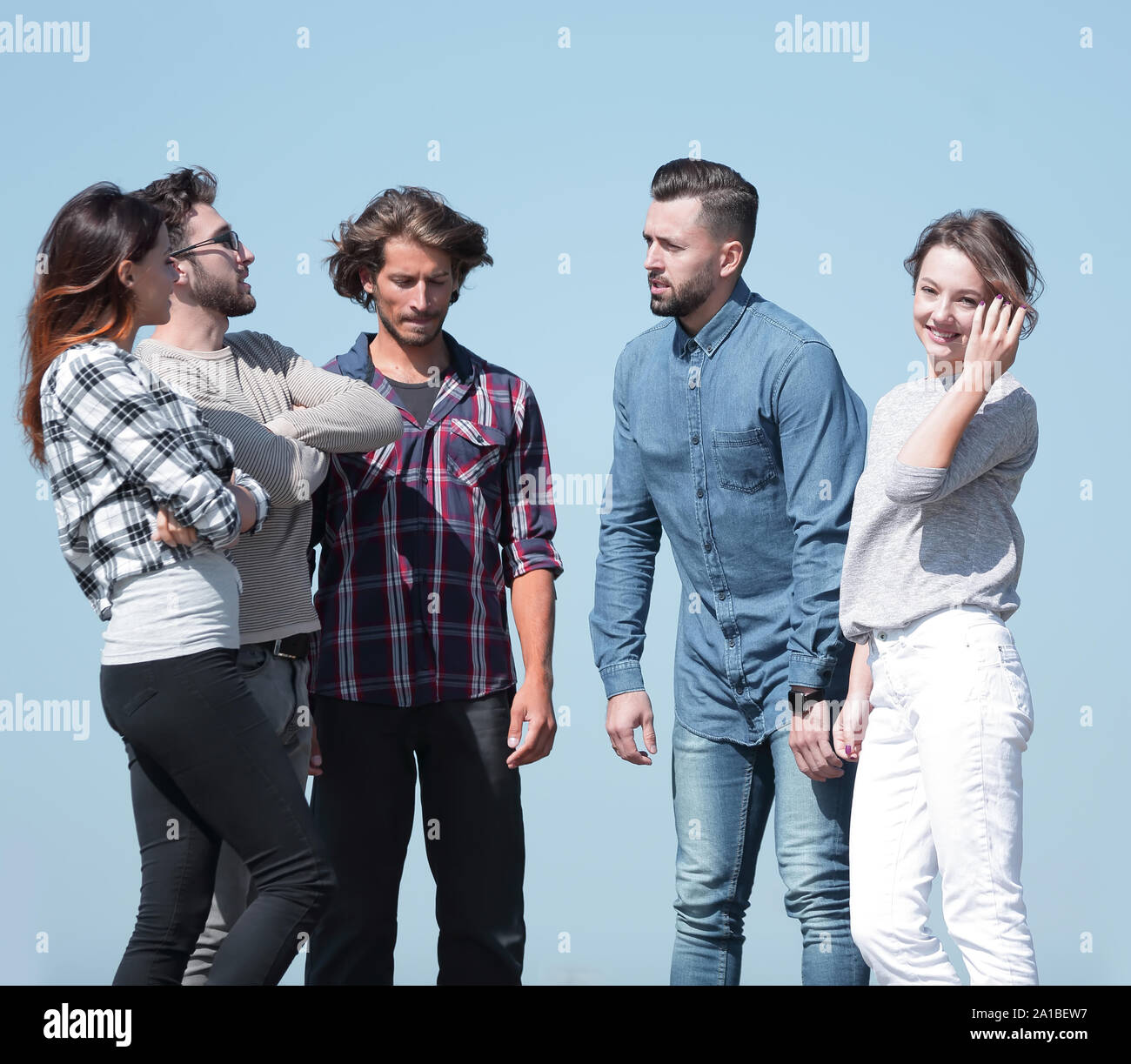 group of students talking while standing outdoors Stock Photo - Alamy