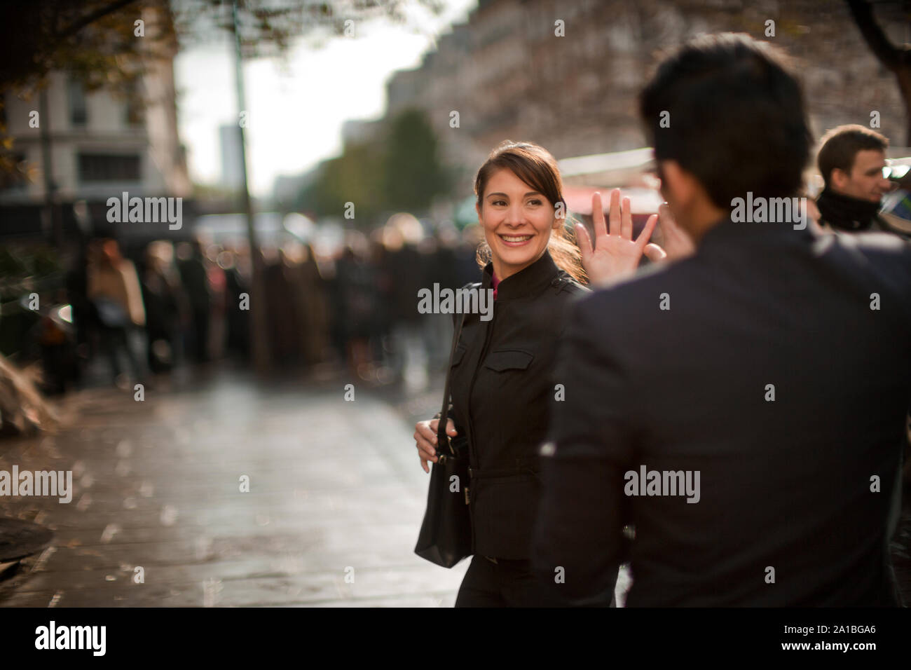 Waving goodbye back view hi-res stock photography and images - Alamy