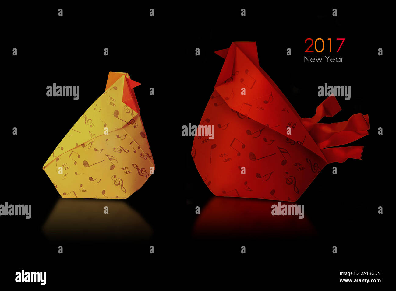 Origami paper hen and rooster Stock Photo - Alamy