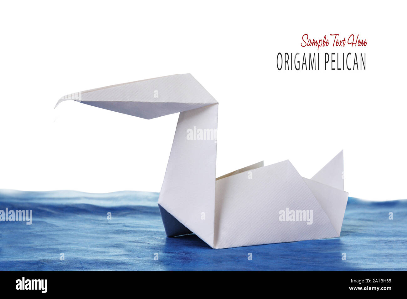 Origami paper pelican Stock Photo - Alamy