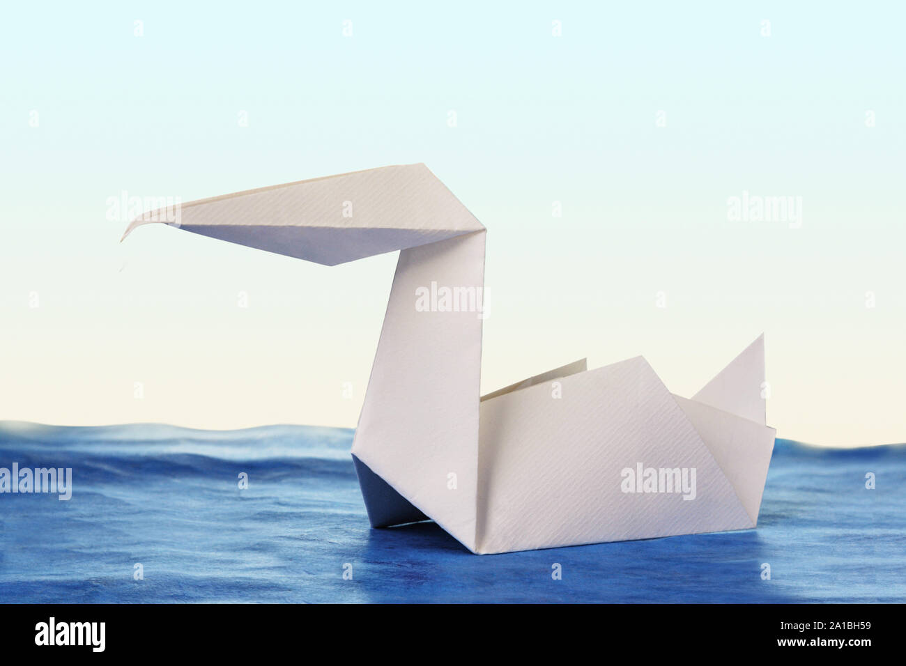 Origami paper pelican Stock Photo - Alamy