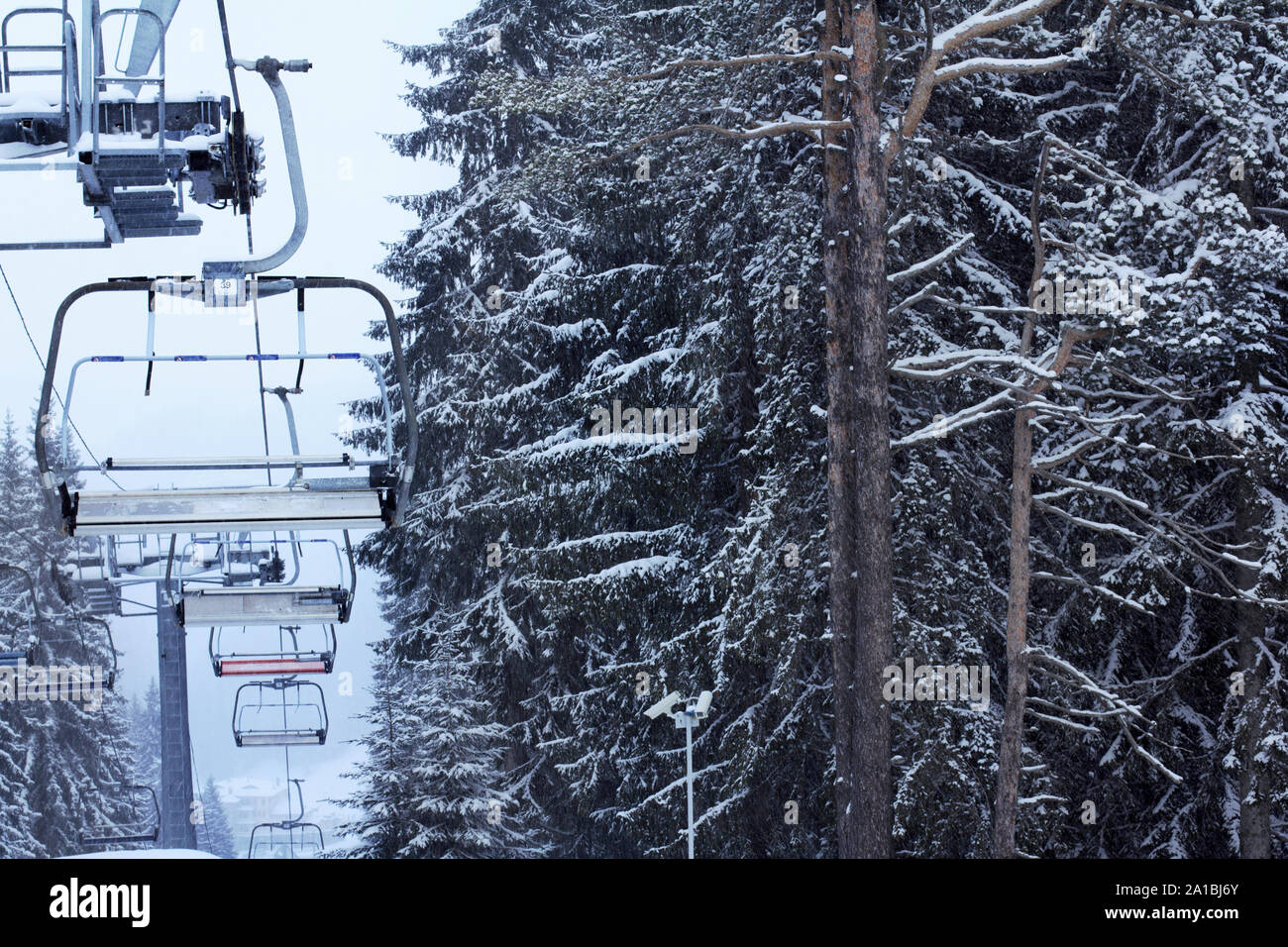 Ski lift in the forest Stock Photo - Alamy